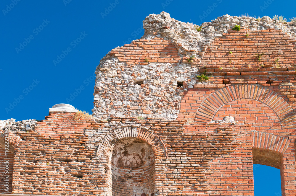 Section of the upper perimetral arcade of the greek theater of Taormina ...