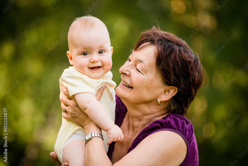 Happy retirement - grandmother with baby Stock Photo | Adobe Stock