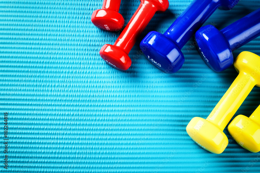 Fitness background with colorful dumbbells. Healthy lifestyle co Stock ...