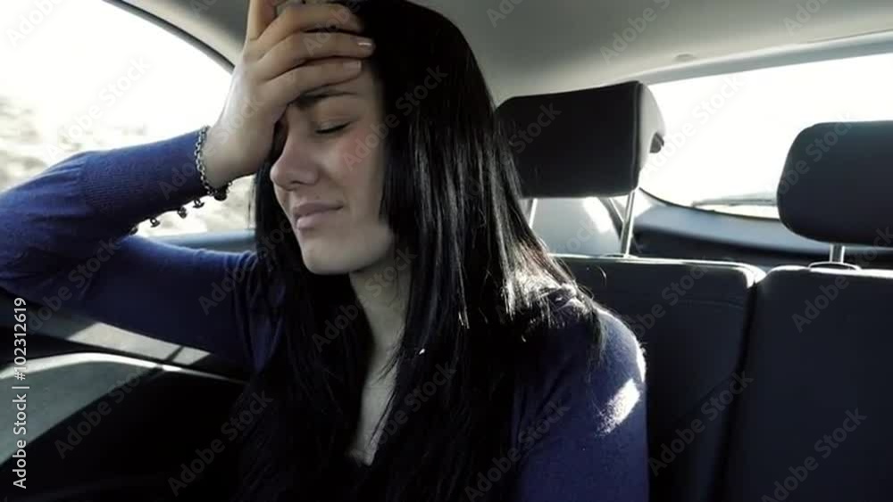 Woman looking out of car window sad feeling bad slow motion Stock Video ...