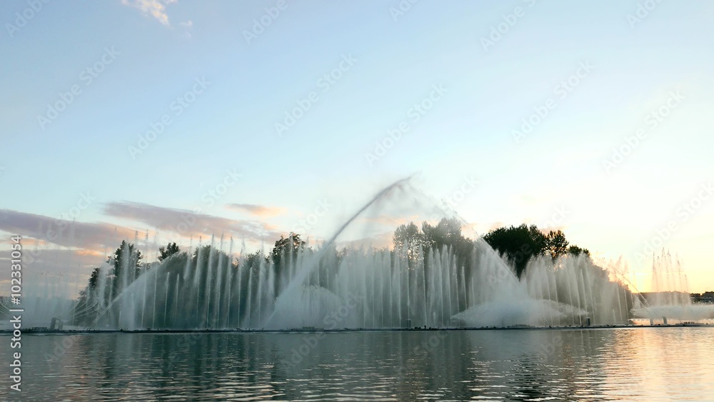 Musical floating fountain in river with colorful lights illumination ...