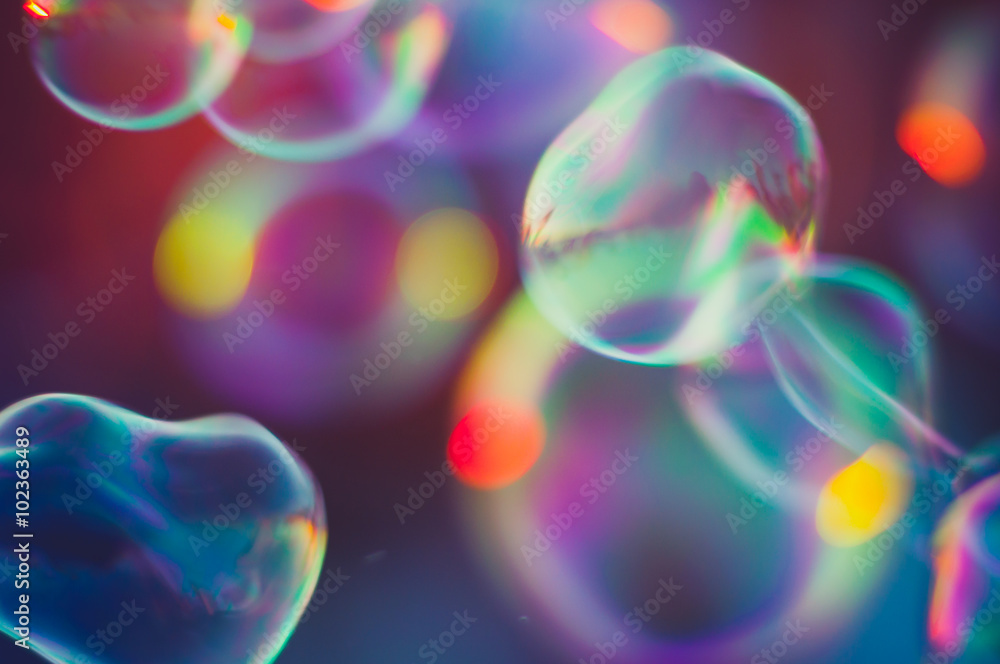 Soap bubbles floating in the air as the Summer sun sets Stock Photo ...
