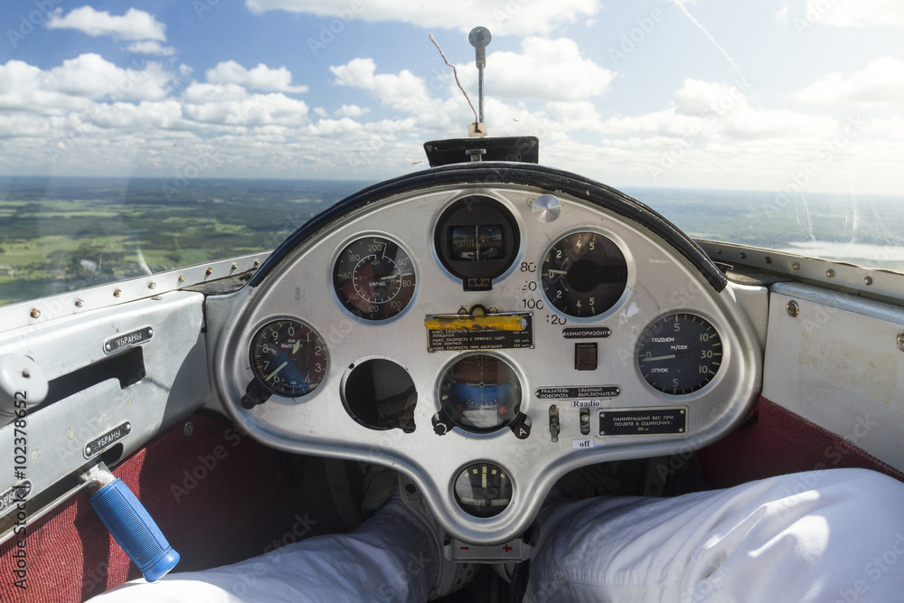 Inside view of a glider plane cockpit and instrument dashboard panel ...