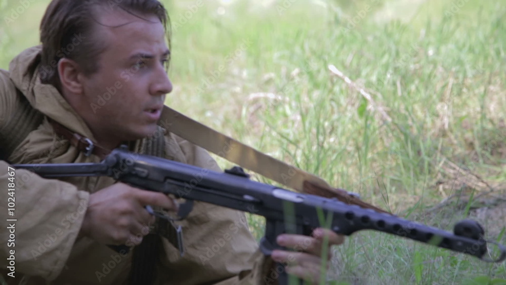 Soviet soldiers take firing position. World war II. The reconstruction ...