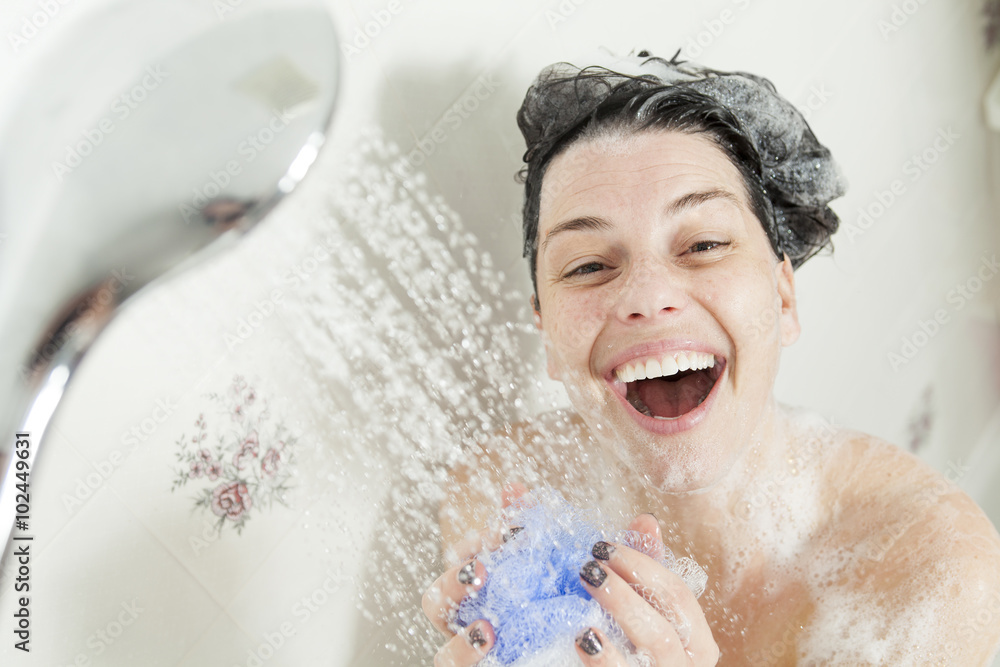 Shower woman. Happy smiling woman washing shoulder showering in Stock ...