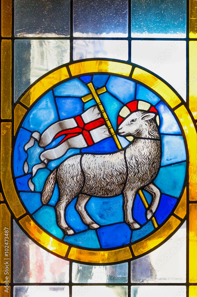 The Lamb of God. Stained glass church window detail. Stock Photo ...