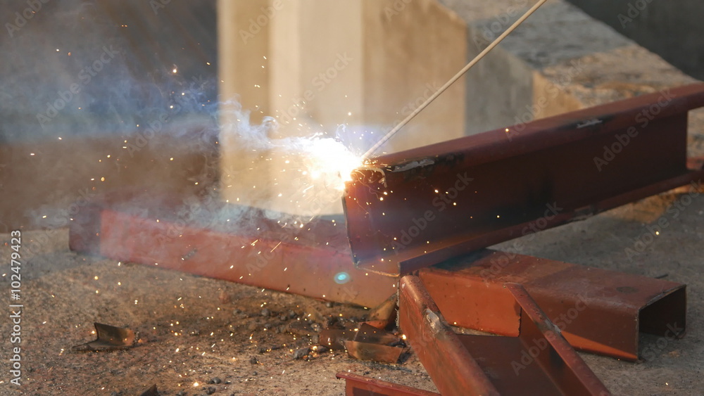 Cutting Steel channel (steel C chanel) with grinder. Sparks while ...