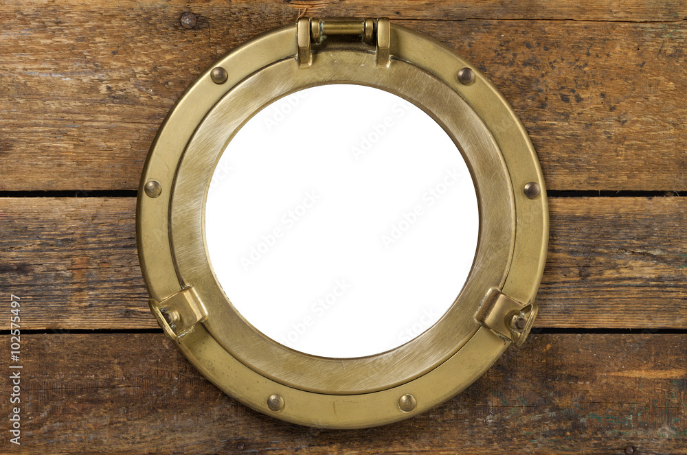Vintage brass porthole in wooden wall isolated with clipping path Stock ...