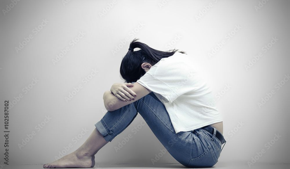 sad woman hug her knee and cry Stock Photo | Adobe Stock