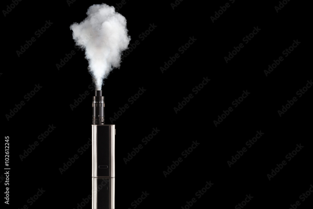 Battery mod or e-cigarette with tank at smoke on black background Stock ...