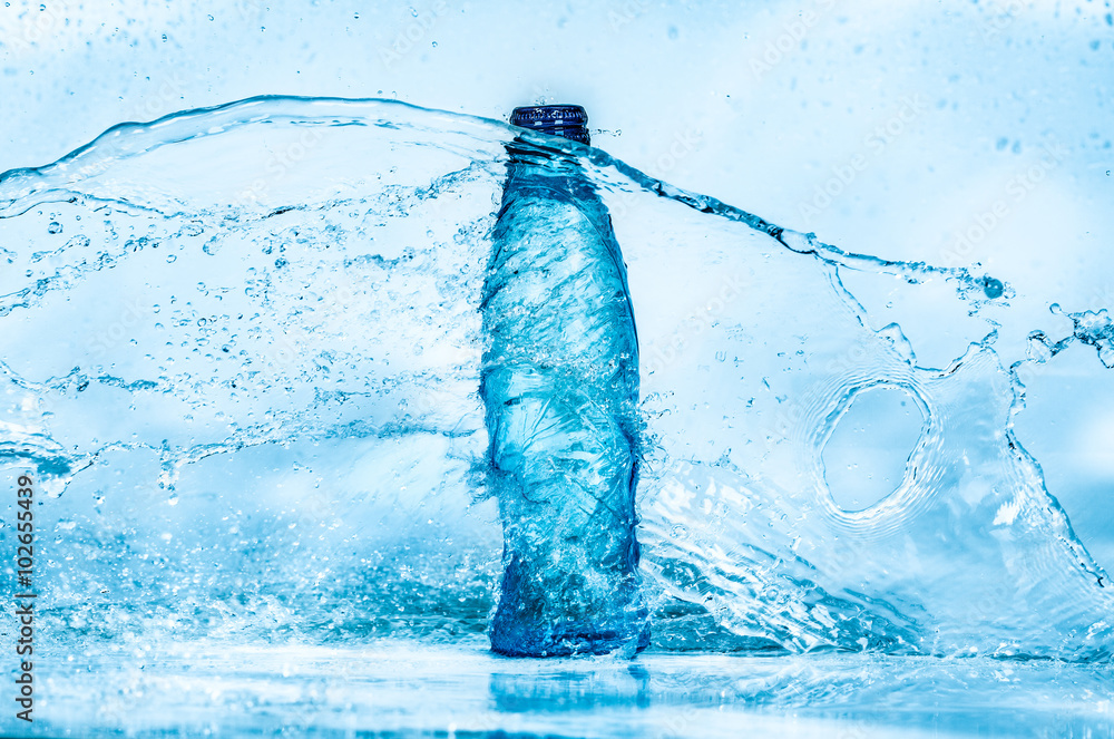 Bottle of water splash Stock Photo | Adobe Stock