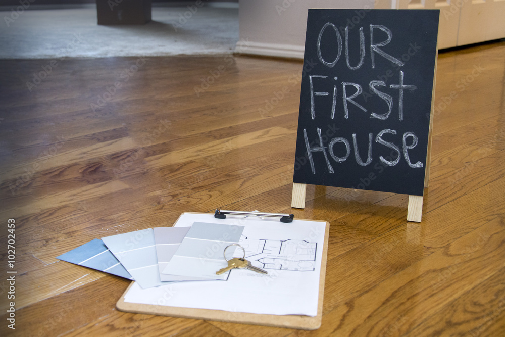 our first house sign with paint swatches and keys to new house Stock ...