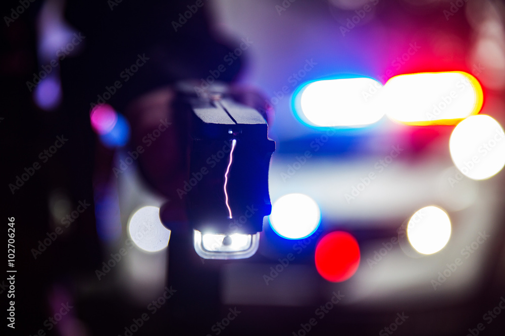 Police officer tazer Stock-Foto | Adobe Stock