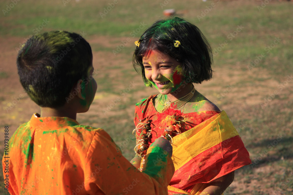 Children are enjoying Holi, the color festival of India. The festival ...