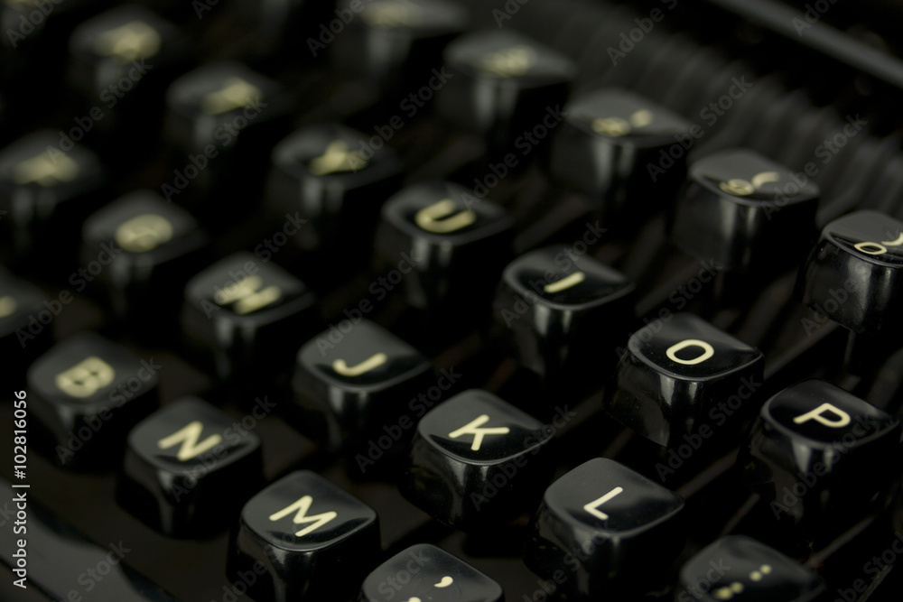 Close up of lettered keys on an old typewriter. Stock Photo | Adobe Stock