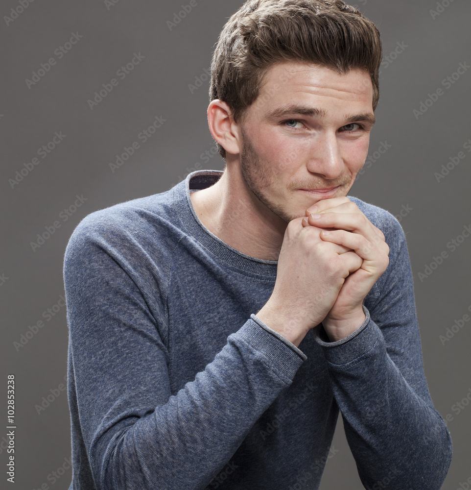 seduction concept - portrait of a smiling seductive young male student ...