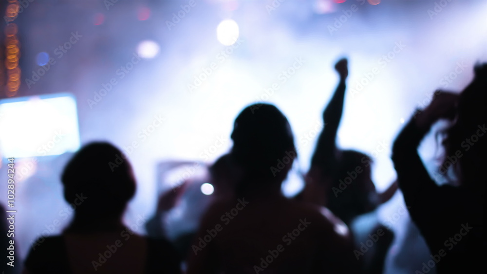 Blurred footage of crazy crowded party with people dancing on the ...
