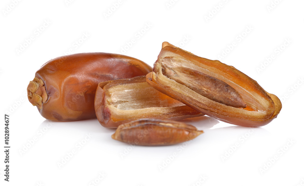 whole and half cut date palm fruit on white background Stock Photo ...