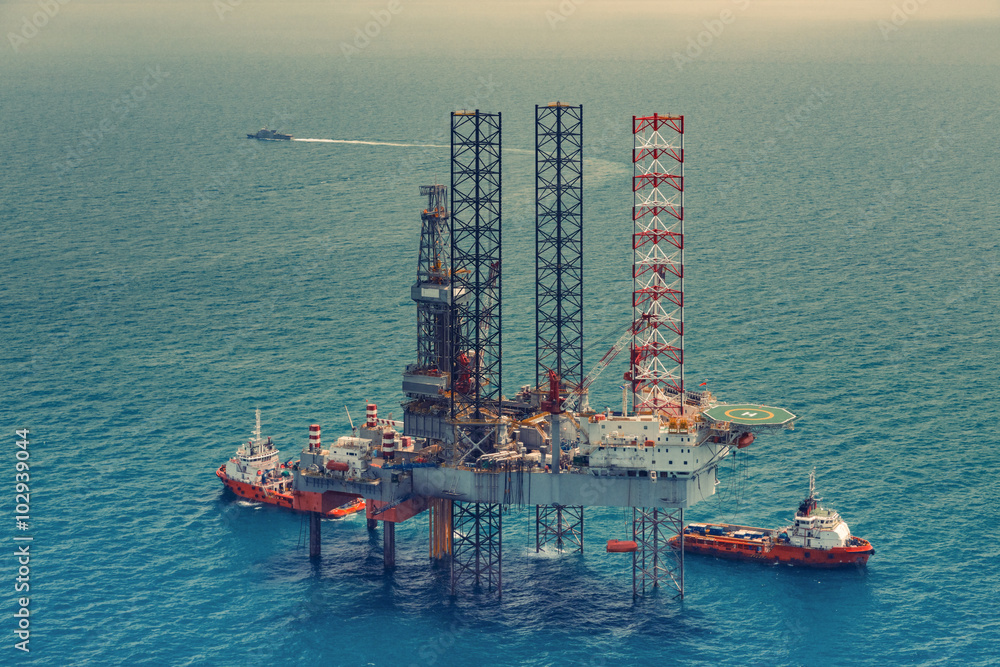 Offshore oil rig drilling platform in the gulf of Thailand(color tone ...