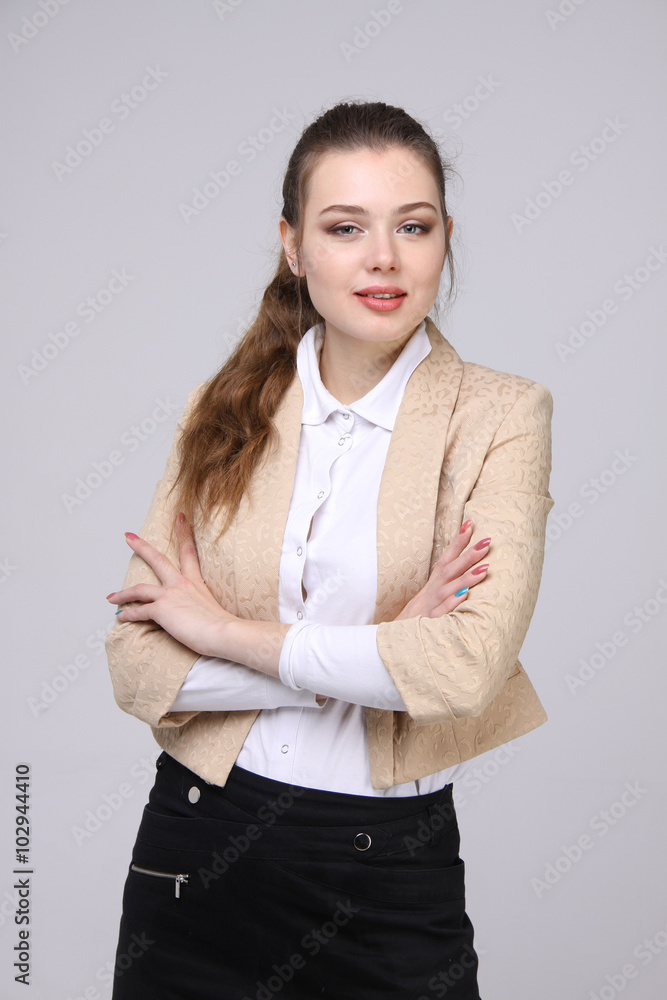 girl standing, arms crossed over his chest Stock Photo | Adobe Stock