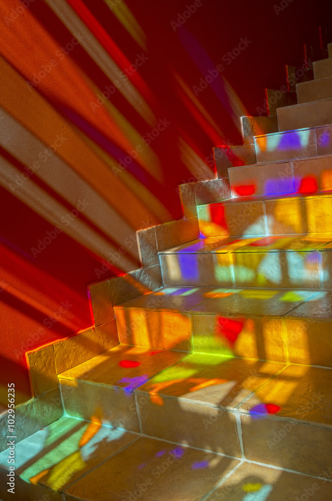 Multi-colored light spots on the steps Stock Photo | Adobe Stock