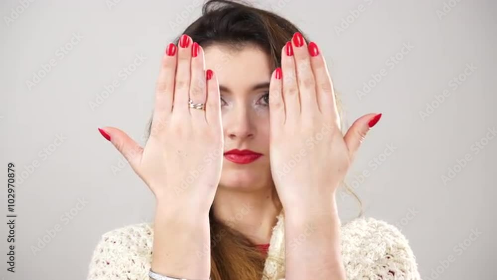 Woman covering face with hands palms 4K. Stock Video | Adobe Stock