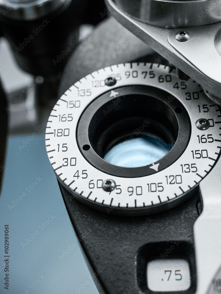 Photograph of a dial on a phoropter in an eye doctor's office. The dial ...