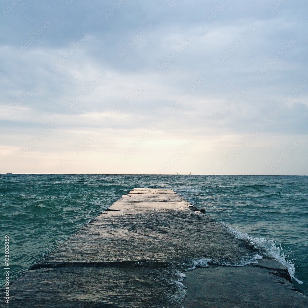 rain and storm sea pier landscape Stock Photo | Adobe Stock