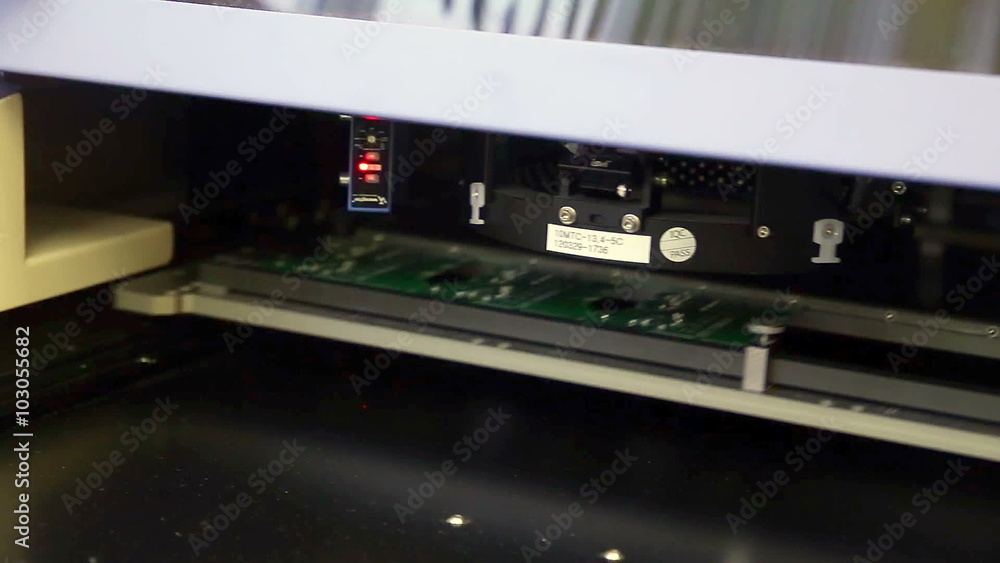 Surface Mount Technology Smt Machine places elements on circuit boards ...
