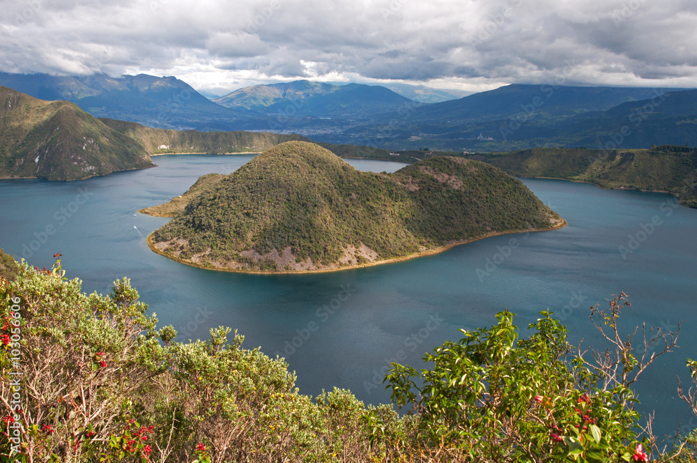 View of the Cuicocha lake and volcano crater, with its center islands ...