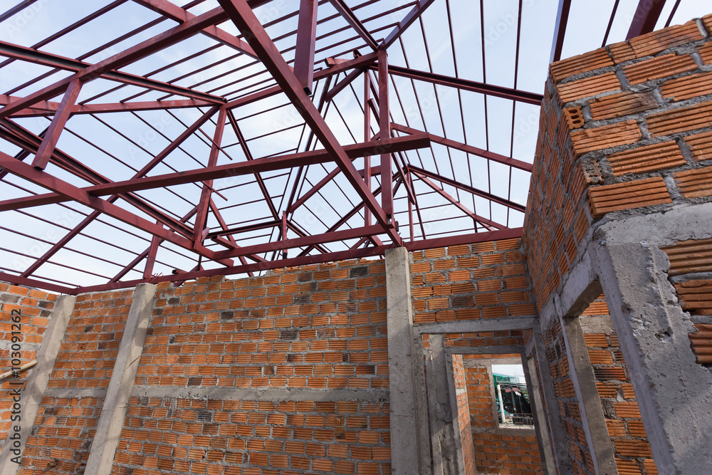 structural steel beam on roof and brick wall of building Stock Photo ...