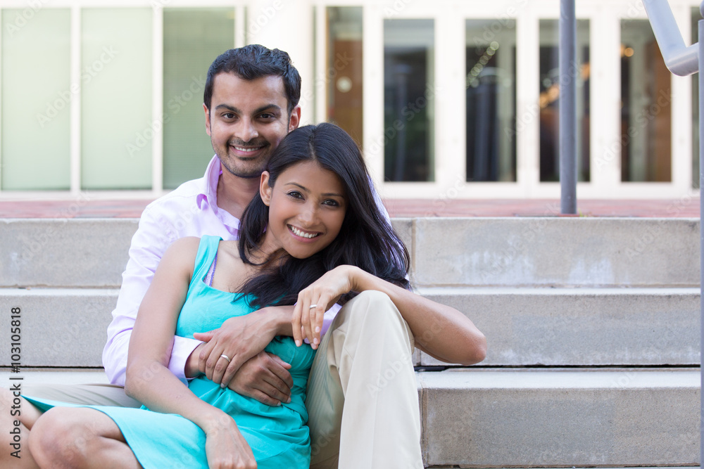 Closeup portrait, attractive wealthy successful couple in pink shirt ...