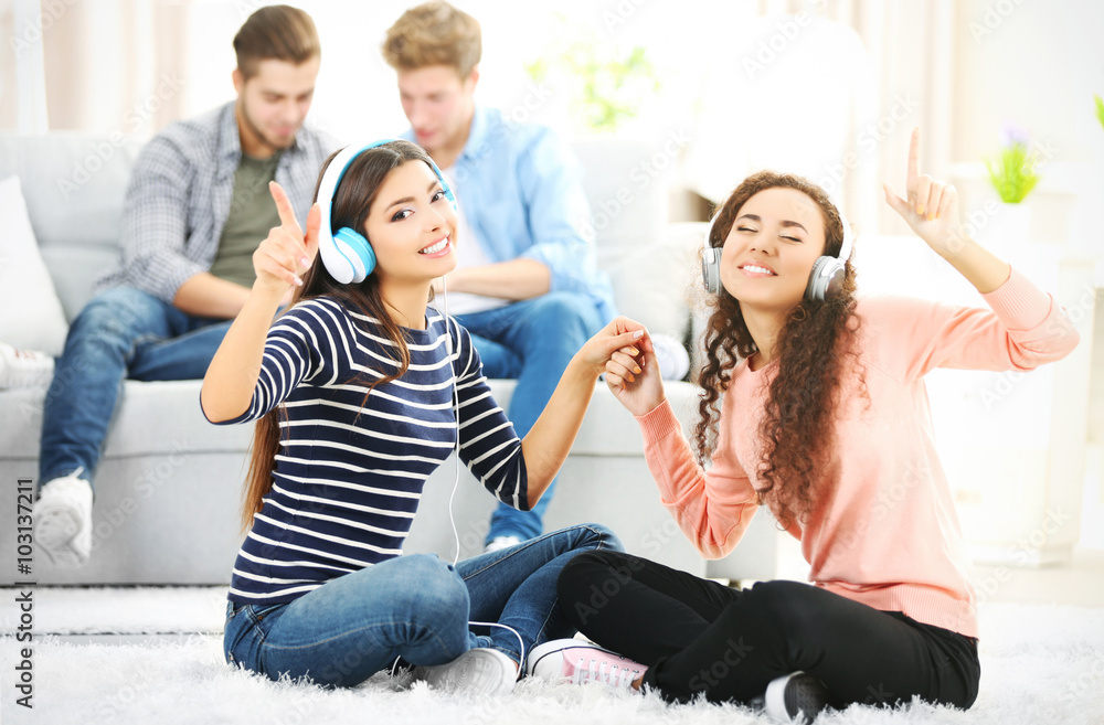 Teens Listening To Music Together
