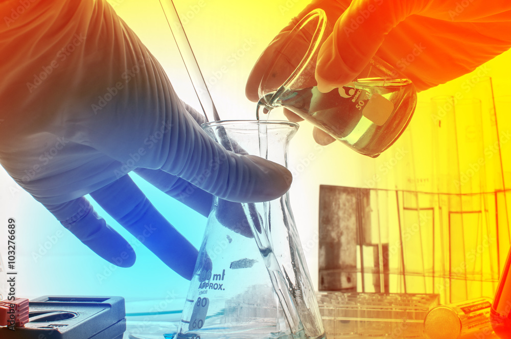 science laboratory test tubes with periodic table background Stock ...