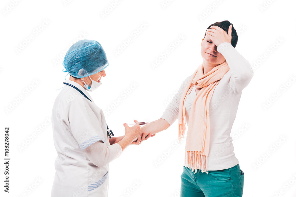 Nurse giving medication to female patient Stock Photo | Adobe Stock