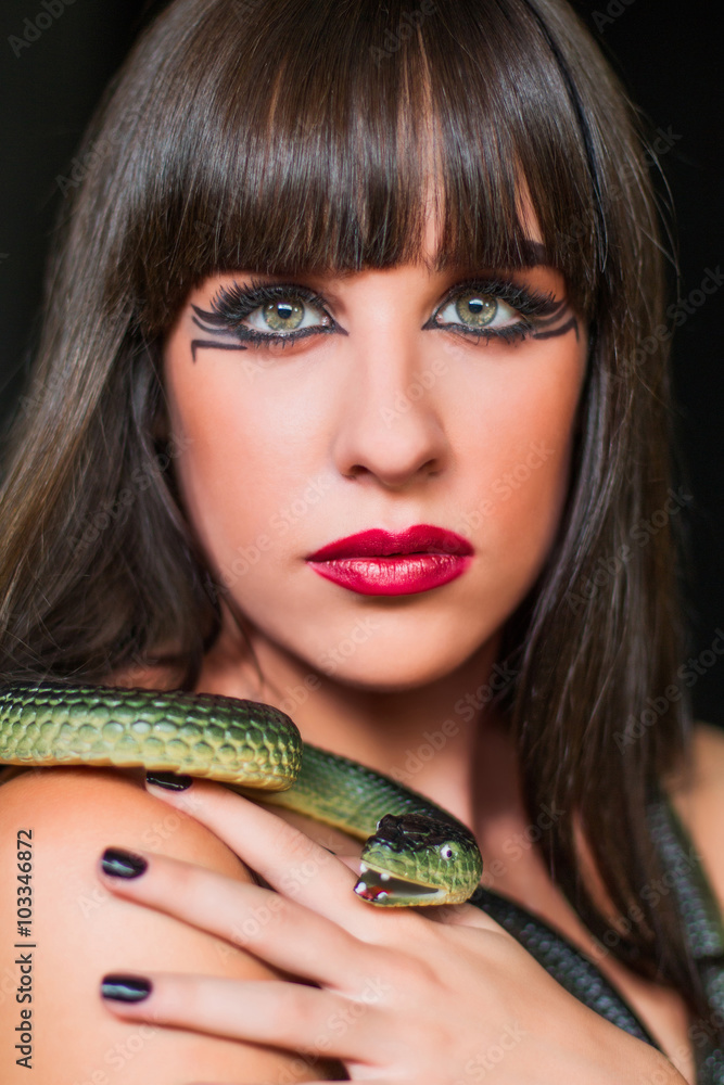 Close up portrait of beautiful girl with snake, black hair Stock Photo ...
