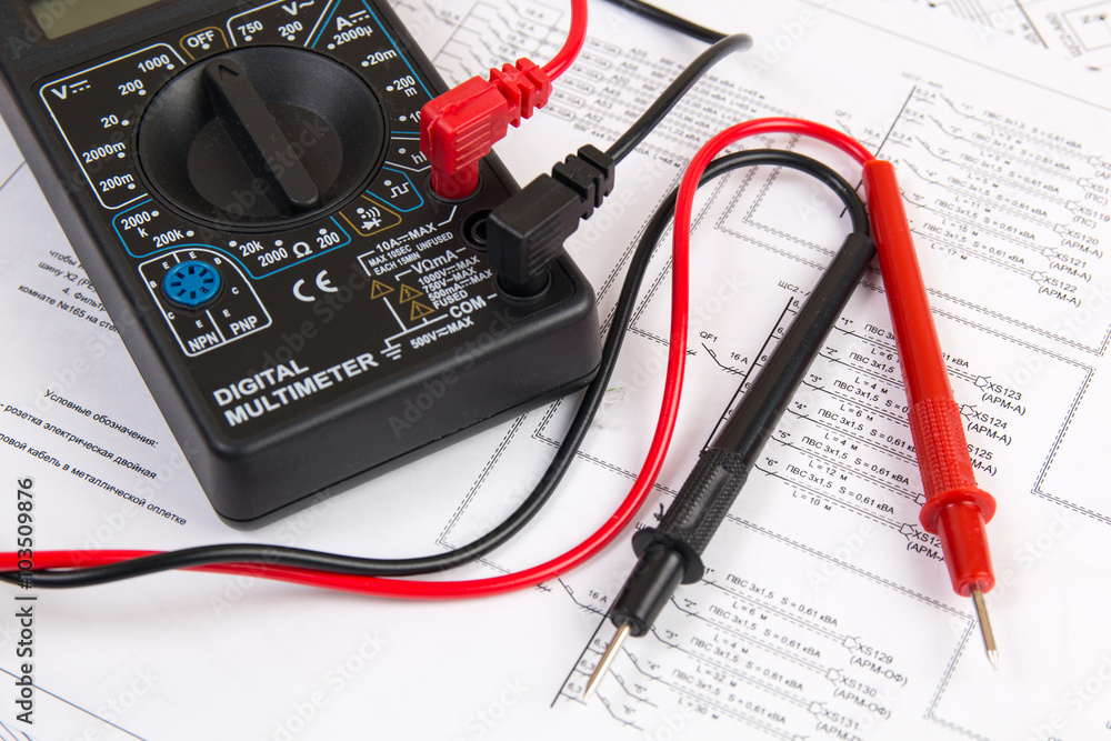 electrical engineering drawings and digital multimeter Stock Photo ...