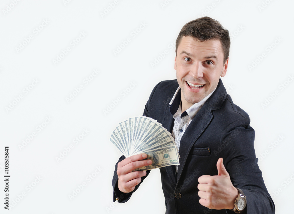 Businessman with wad of money in studio on a white background Stock ...