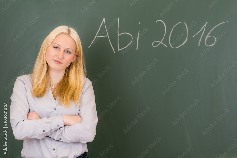 abiturientin vor der tafel Stock-Foto | Adobe Stock