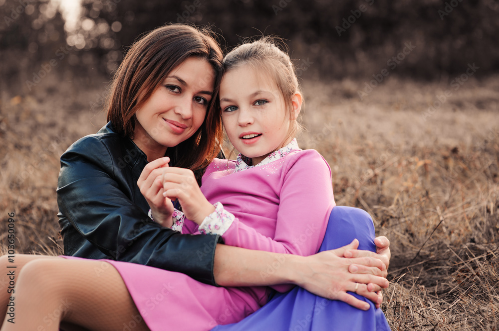 lifestyle capture of happy mother and preteen daughter having fun ...