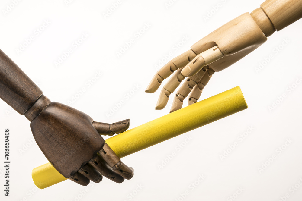 Handover between a black hand and a white hand Stock Photo | Adobe Stock