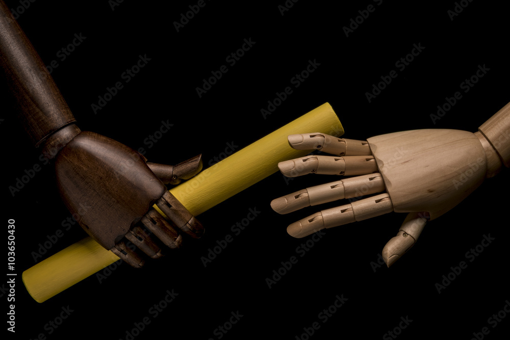 Handover between a black hand and a white hand Stock Photo | Adobe Stock