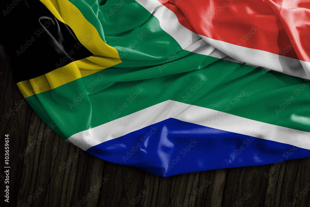 South African flag on wooden table Stock Photo | Adobe Stock