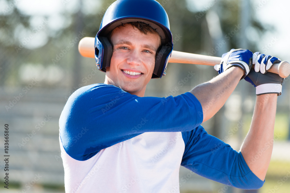 Baseball player swinging bat Stock Photo | Adobe Stock