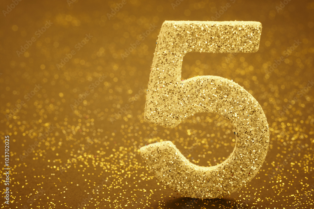 Number five golden color over a warm background. Anniversary Stock ...