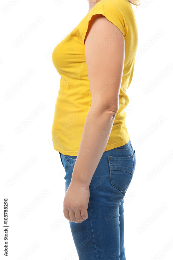 Chubby woman's body in yellow tee-shirt and jeans isolated on white ...