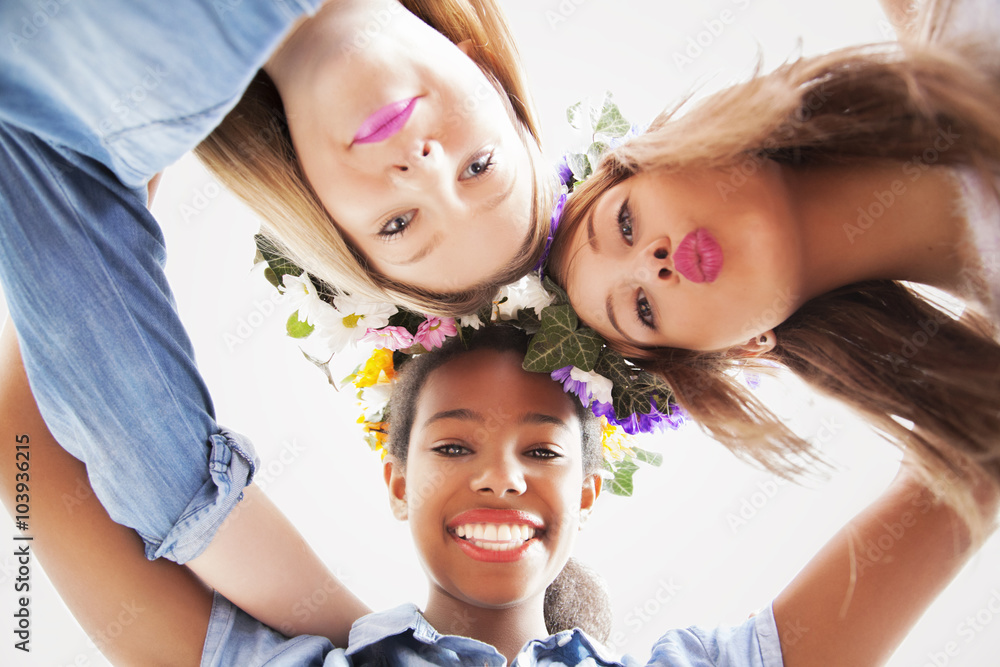 Cute teenage mixed race girls smiling, close - up. Group of cute young ...