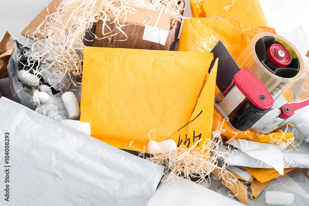 Pile of used and tore postal packages symbolize a waste pollution ...