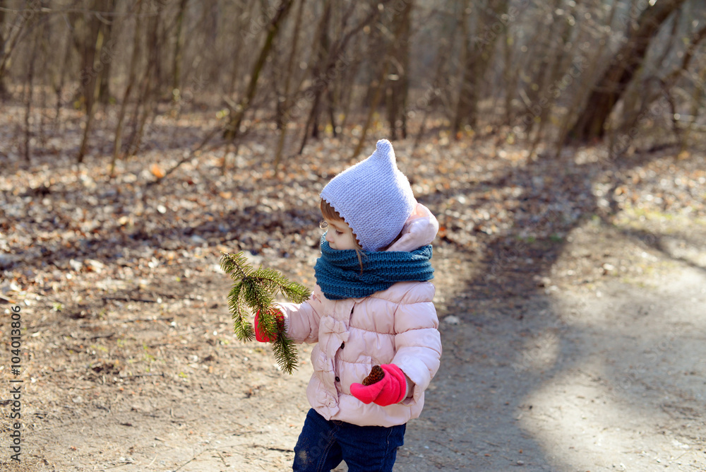 Little girl on a nature scavenger hunt Stock Photo | Adobe Stock