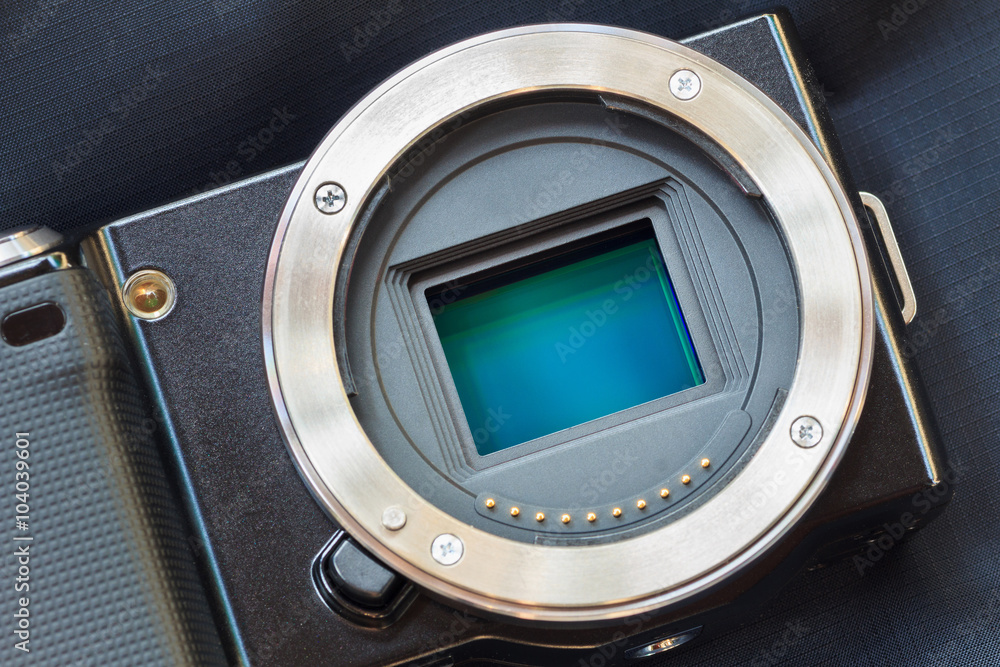 Digital camera sensor/APS-C CMOS sensor on a digital mirrorless Stock ...